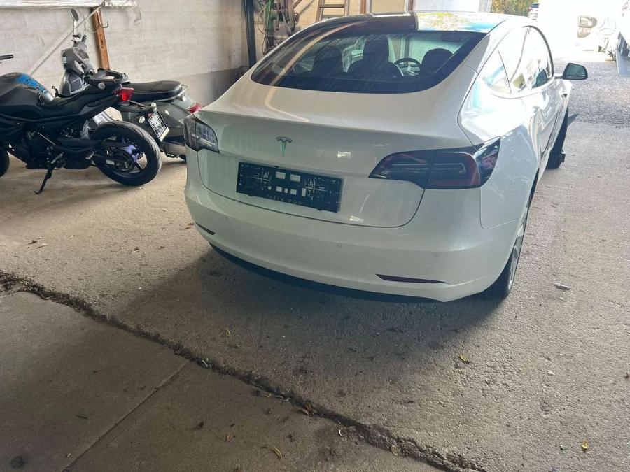 White Tesla Model 3 2020 in Marijampole, with an engine capacity of 0.00 L and mileage of 73 thousand km for 12200 €, photo 5 on AUTOMOTO.COM.LV