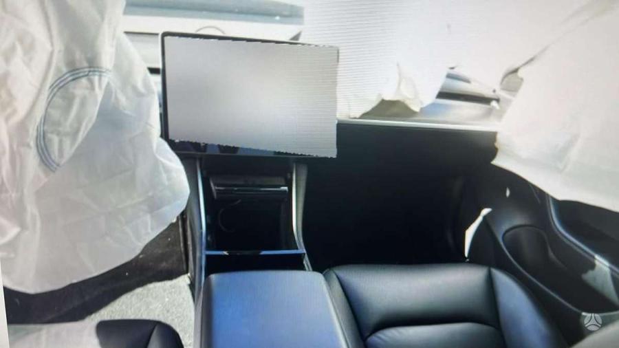 White Tesla Model 3 2020 in Marijampole, with an engine capacity of 0.00 L and mileage of 73 thousand km for 12200 €, photo 9 on AUTOMOTO.COM.LV
