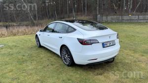 White Tesla Model 3 2021 in Riga, with an engine capacity of 0.00 L and mileage of 193 thousand km for 22500 €, photo 7 on AUTOMOTO.COM.LV