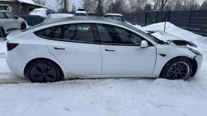 White Tesla Model 3 2021 in Jonava, with an engine capacity of 0.00 L and mileage of 60 thousand km for 9550 €, photo 7 on AUTOMOTO.COM.LV