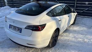 White Tesla Model 3 2021 in Jonava, with an engine capacity of 0.00 L and mileage of 60 thousand km for 9550 €, photo 13 on AUTOMOTO.COM.LV