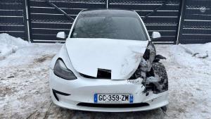 White Tesla Model 3 2021 in Jonava, with an engine capacity of 0.00 L and mileage of 60 thousand km for 9350 €, photo 10 on AUTOMOTO.COM.LV