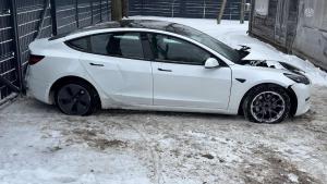 White Tesla Model 3 2021 in Jonava, with an engine capacity of 0.00 L and mileage of 66 thousand km for 8850 €, photo 8 on AUTOMOTO.COM.LV