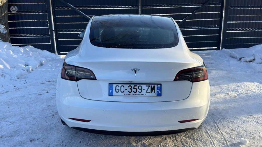 White Tesla Model 3 2021 in Jonava, with an engine capacity of 0.00 L and mileage of 66 thousand km for 8850 €, photo 14 on AUTOMOTO.COM.LV