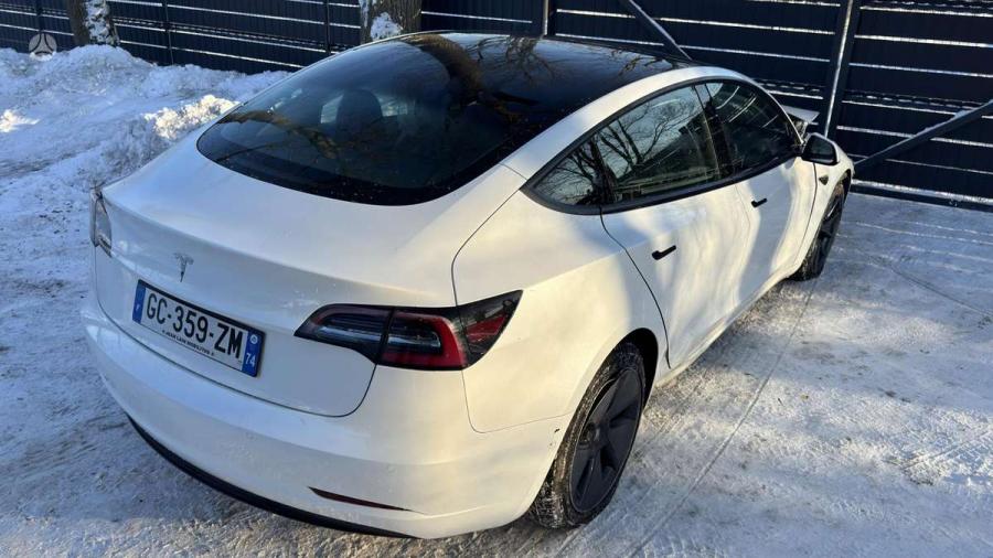 White Tesla Model 3 2021 in Jonava, with an engine capacity of 0.00 L and mileage of 66 thousand km for 8850 €, photo 15 on AUTOMOTO.COM.LV