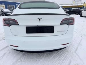 White Tesla Model 3 2021 in Siauliai, with an engine capacity of 0.00 L and mileage of 22 thousand km for 18850 €, photo 5 on AUTOMOTO.COM.LV