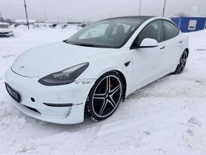 White Tesla Model 3 2021 in Siauliai, with an engine capacity of 0.00 L and mileage of 22 thousand km for 18850 €, photo 7 on AUTOMOTO.COM.LV