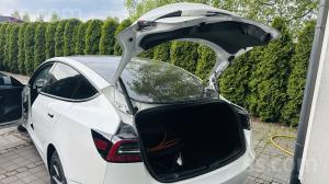 White Tesla Model 3 2021 in Riga, with an engine capacity of 0.00 L and mileage of 75 thousand km for 23800 €, photo 8 on AUTOMOTO.COM.LV