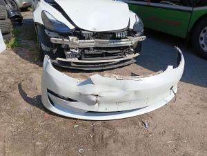 White Tesla Model 3 2021 in Marijampole, with an engine capacity of 0.00 L and mileage of 174 thousand km for 12500 €, photo 7 on AUTOMOTO.COM.LV