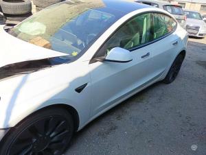 White Tesla Model 3 2021 in Marijampole, with an engine capacity of 0.00 L and mileage of 174 thousand km for 12500 €, photo 12 on AUTOMOTO.COM.LV