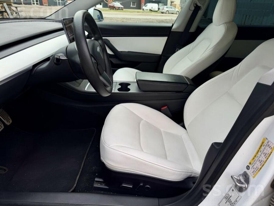 White Tesla Model 3 2021 in Cesis, with an engine capacity of 0.00 L and mileage of 129 thousand km for 26000 €, photo 16 on AUTOMOTO.COM.LV