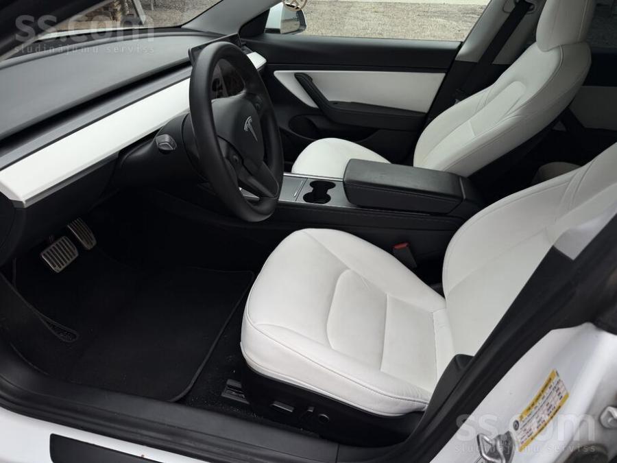 White Tesla Model 3 2021 in Cesis, with an engine capacity of 0.00 L and mileage of 129 thousand km for 26000 €, photo 22 on AUTOMOTO.COM.LV