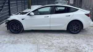 White Tesla Model 3 2023 in Jonava, with an engine capacity of 0.00 L and mileage of 138 thousand km for 8450 €, photo 16 on AUTOMOTO.COM.LV