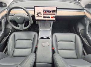 White Tesla Model 3 2023 in Klaipeda, with an engine capacity of 0.00 L and mileage of 63 thousand km for 11500 €, photo 6 on AUTOMOTO.COM.LV