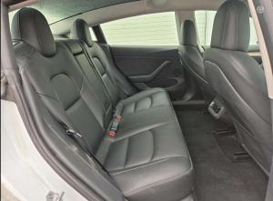 White Tesla Model 3 2023 in Klaipeda, with an engine capacity of 0.00 L and mileage of 63 thousand km for 11500 €, photo 7 on AUTOMOTO.COM.LV