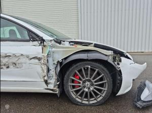 White Tesla Model 3 2023 in Klaipeda, with an engine capacity of 0.00 L and mileage of 63 thousand km for 11500 €, photo 12 on AUTOMOTO.COM.LV