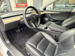 White Tesla Model 3 2023 in Riga, with an engine capacity of 0.00 L and mileage of 60 thousand km for 28900 €, photo 9 on AUTOMOTO.COM.LV