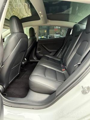 White Tesla Model 3 2023 in Riga, with an engine capacity of 0.00 L and mileage of 60 thousand km for 28900 €, photo 13 on AUTOMOTO.COM.LV