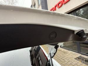 White Tesla Model 3 2023 in Riga, with an engine capacity of 0.00 L and mileage of 60 thousand km for 28900 €, photo 15 on AUTOMOTO.COM.LV