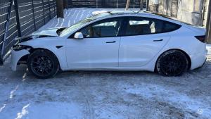 Balts Tesla Model 3 2024 Jonava, ar dzinēja tilpumu 0.00 L un nobraukumu 87 tūkst. km par 12900 €, foto 4 vietnē AUTOMOTO.COM.LV