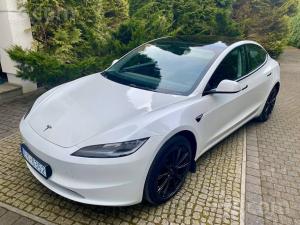 White Tesla Model 3 2024 in Riga, with an engine capacity of 0.00 L and mileage of 14 thousand km for 35000 €, photo  on AUTOMOTO.COM.LV