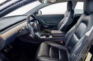White Tesla Model 3 2019 in Riga, with an engine capacity of 0.00 L and mileage of 150 thousand km for 17777 €, photo 3 on AUTOMOTO.COM.LV