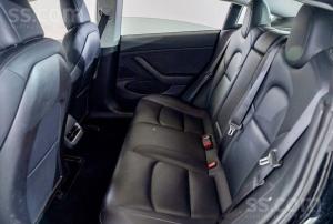 White Tesla Model 3 2019 in Riga, with an engine capacity of 0.00 L and mileage of 150 thousand km for 17777 €, photo 5 on AUTOMOTO.COM.LV