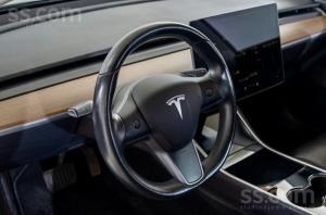 White Tesla Model 3 2019 in Riga, with an engine capacity of 0.00 L and mileage of 150 thousand km for 17777 €, photo 6 on AUTOMOTO.COM.LV