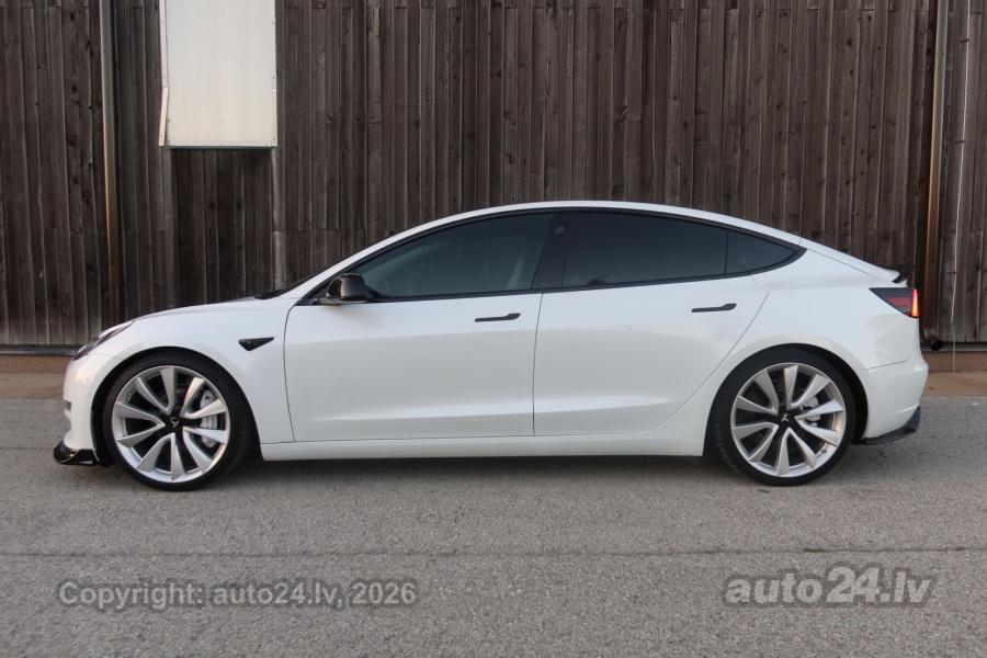 White Tesla Model 3 2019 in Tallinn, with an engine capacity of 0.00 L and mileage of 90 thousand km for 24400 €, photo 4 on AUTOMOTO.COM.LV
