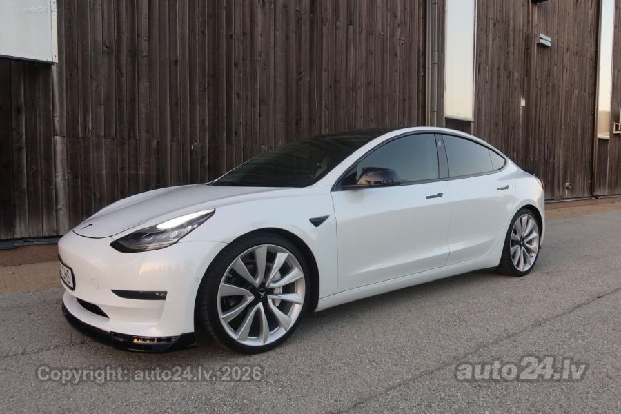 White Tesla Model 3 2019 in Tallinn, with an engine capacity of 0.00 L and mileage of 90 thousand km for 24400 €, photo 7 on AUTOMOTO.COM.LV