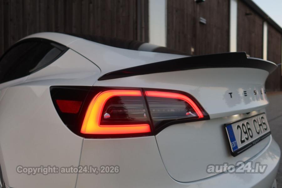 White Tesla Model 3 2019 in Tallinn, with an engine capacity of 0.00 L and mileage of 90 thousand km for 24400 €, photo 14 on AUTOMOTO.COM.LV