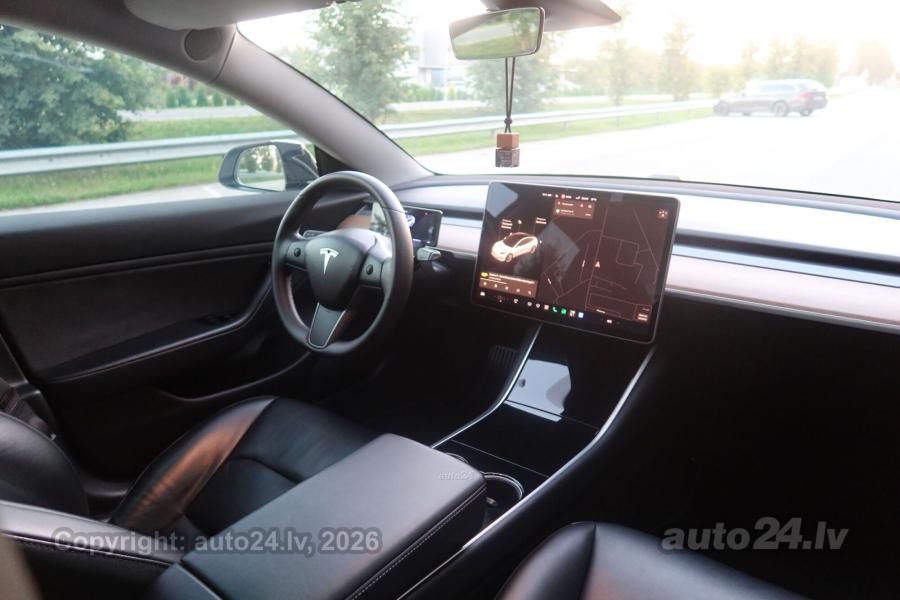 White Tesla Model 3 2019 in Tallinn, with an engine capacity of 0.00 L and mileage of 90 thousand km for 24400 €, photo 20 on AUTOMOTO.COM.LV