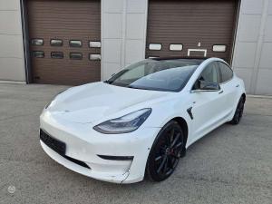 Balts Tesla Model 3 2019 Mažeikiai, ar dzinēja tilpumu 0.00 L un nobraukumu 178 tūkst. km par 14400 €, foto  vietnē AUTOMOTO.COM.LV