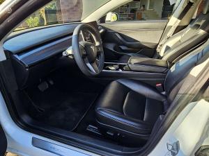 White Tesla Model 3 2019 in Vilnius, with an engine capacity of 0.00 L and mileage of 119 thousand km for 19500 €, photo 8 on AUTOMOTO.COM.LV