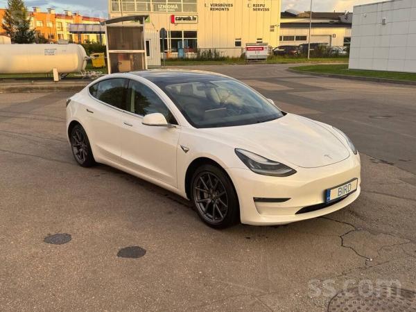 White Tesla Model 3 2020 in Riga, with an engine capacity of 0.00 L and mileage of 170 thousand km for 21000 €, photo 5 on AUTOMOTO.COM.LV
