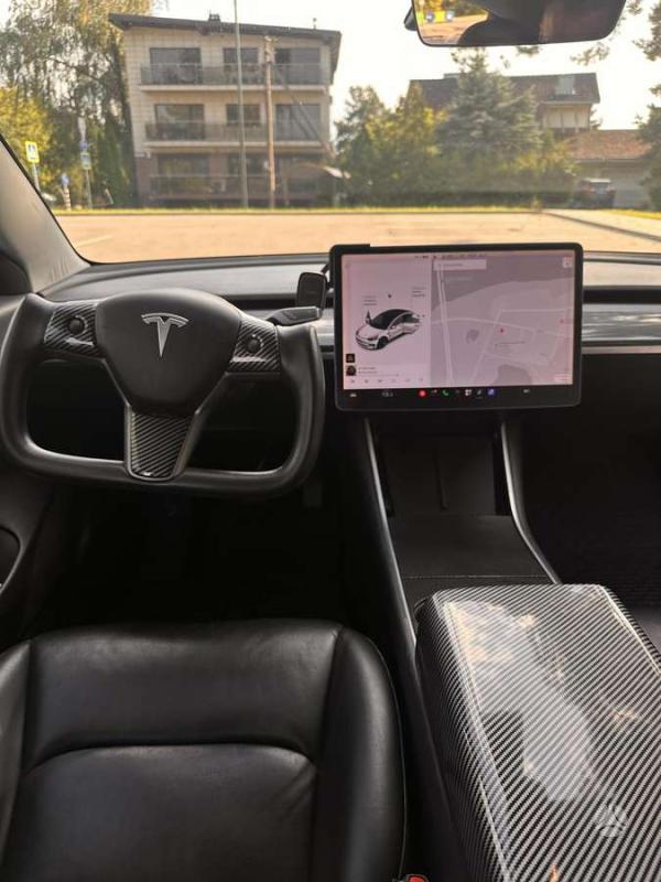 White Tesla Model 3 2020 in Kaunas, with an engine capacity of 0.00 L and mileage of 117 thousand km for 18800 €, photo 11 on AUTOMOTO.COM.LV