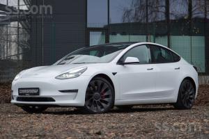 White Tesla Model 3 2021 in Riga, with an engine capacity of 0.00 L and mileage of 92 thousand km for 27990 €, photo 2 on AUTOMOTO.COM.LV