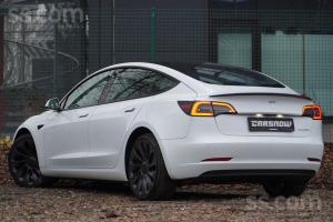 White Tesla Model 3 2021 in Riga, with an engine capacity of 0.00 L and mileage of 92 thousand km for 27990 €, photo 10 on AUTOMOTO.COM.LV