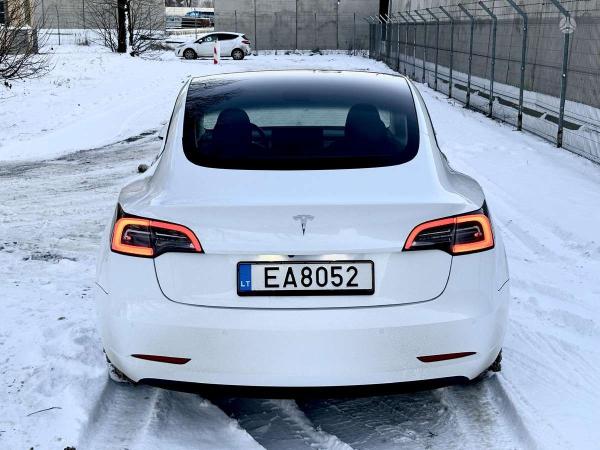 White Tesla Model 3 2021 in Klaipeda, with an engine capacity of 0.00 L and mileage of 53 thousand km for 19500 €, photo 6 on AUTOMOTO.COM.LV
