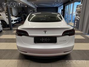 White Tesla Model 3 2021 in Riga, with an engine capacity of 0.00 L and mileage of 115 thousand km for 24990 €, photo 5 on AUTOMOTO.COM.LV