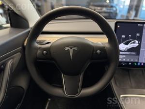 White Tesla Model 3 2021 in Riga, with an engine capacity of 0.00 L and mileage of 115 thousand km for 24990 €, photo 24 on AUTOMOTO.COM.LV