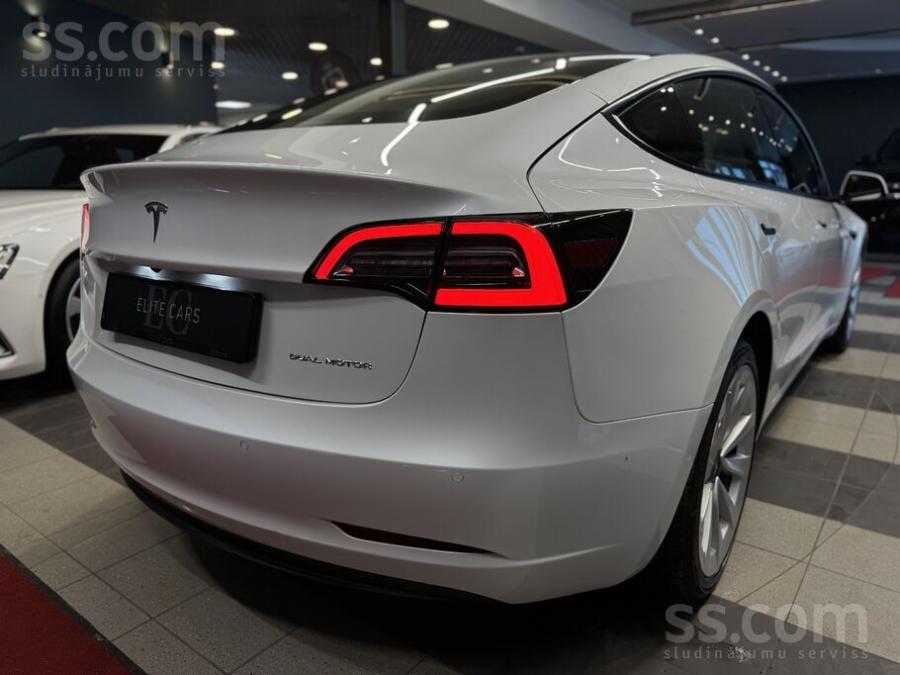 White Tesla Model 3 2021 in Riga, with an engine capacity of 0.00 L and mileage of 115 thousand km for 24990 €, photo 25 on AUTOMOTO.COM.LV
