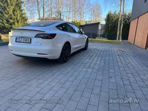 White Tesla Model 3 2021 in Tallinn, with an engine capacity of 0.00 L and mileage of 87 thousand km for 29000 €, photo 6 on AUTOMOTO.COM.LV