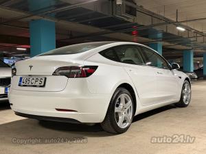 White Tesla Model 3 2021 in Tallinn, with an engine capacity of 0.00 L and mileage of 83 thousand km for 28490 €, photo 4 on AUTOMOTO.COM.LV