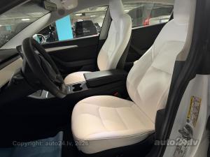 White Tesla Model 3 2021 in Tallinn, with an engine capacity of 0.00 L and mileage of 83 thousand km for 28490 €, photo 6 on AUTOMOTO.COM.LV