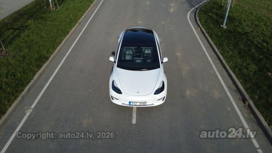 White Tesla Model 3 2021 in Tallinn, with an engine capacity of 0.00 L and mileage of 102 thousand km for 27500 €, photo 14 on AUTOMOTO.COM.LV