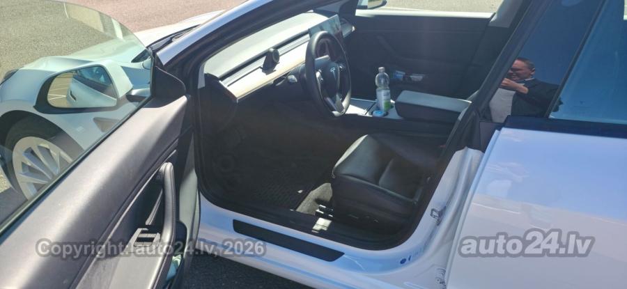 White Tesla Model 3 2021 in Tallinn, with an engine capacity of 0.00 L and mileage of 87 thousand km for 27400 €, photo 7 on AUTOMOTO.COM.LV