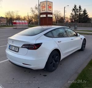 White Tesla Model 3 2021 in Tallinn, with an engine capacity of 0.00 L and mileage of 65 thousand km for 25800 €, photo 3 on AUTOMOTO.COM.LV