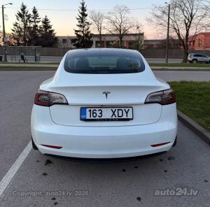 White Tesla Model 3 2021 in Tallinn, with an engine capacity of 0.00 L and mileage of 65 thousand km for 25800 €, photo 8 on AUTOMOTO.COM.LV