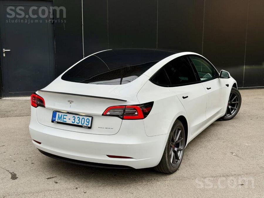 Balts Tesla Model 3 2021 Cēsis, ar dzinēja tilpumu 0.00 L un nobraukumu 129 tūkst. km par 26900 €, foto 3 vietnē AUTOMOTO.COM.LV